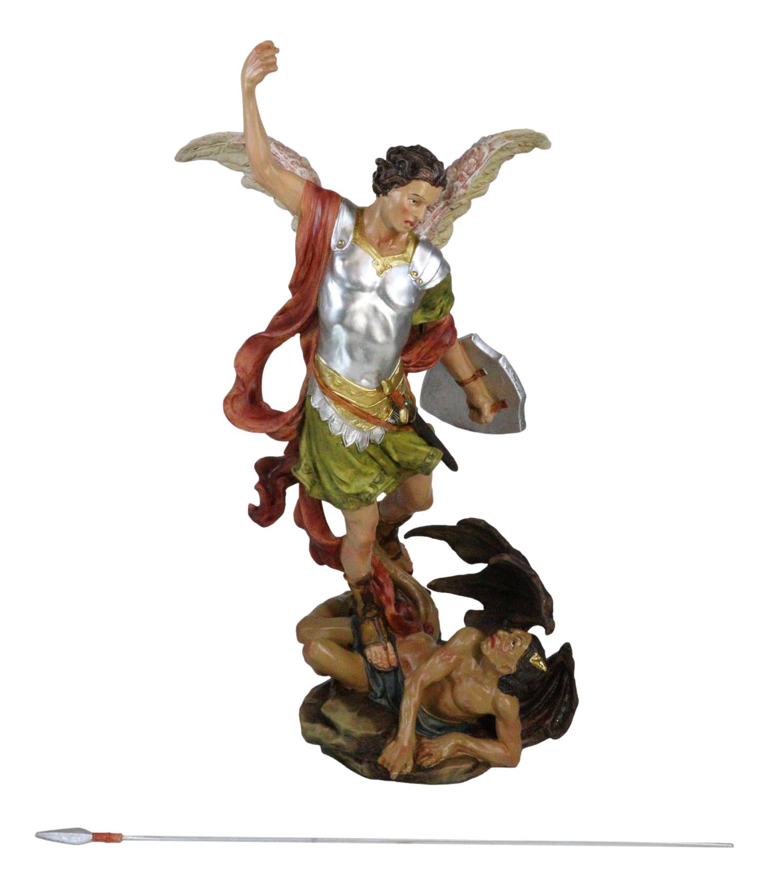 Archangel Saint Michael With Spear And Shield Trampling The Devil Stat ...